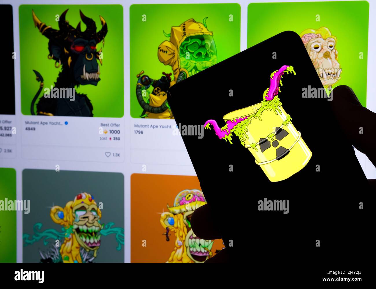 Mega Mutant Serum NFT seen on the silhouette of smartphone and some of ...