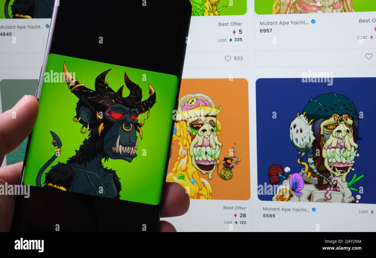 MUTANT APE NFT #4849 seen on the silhouette of smartphone and some ...