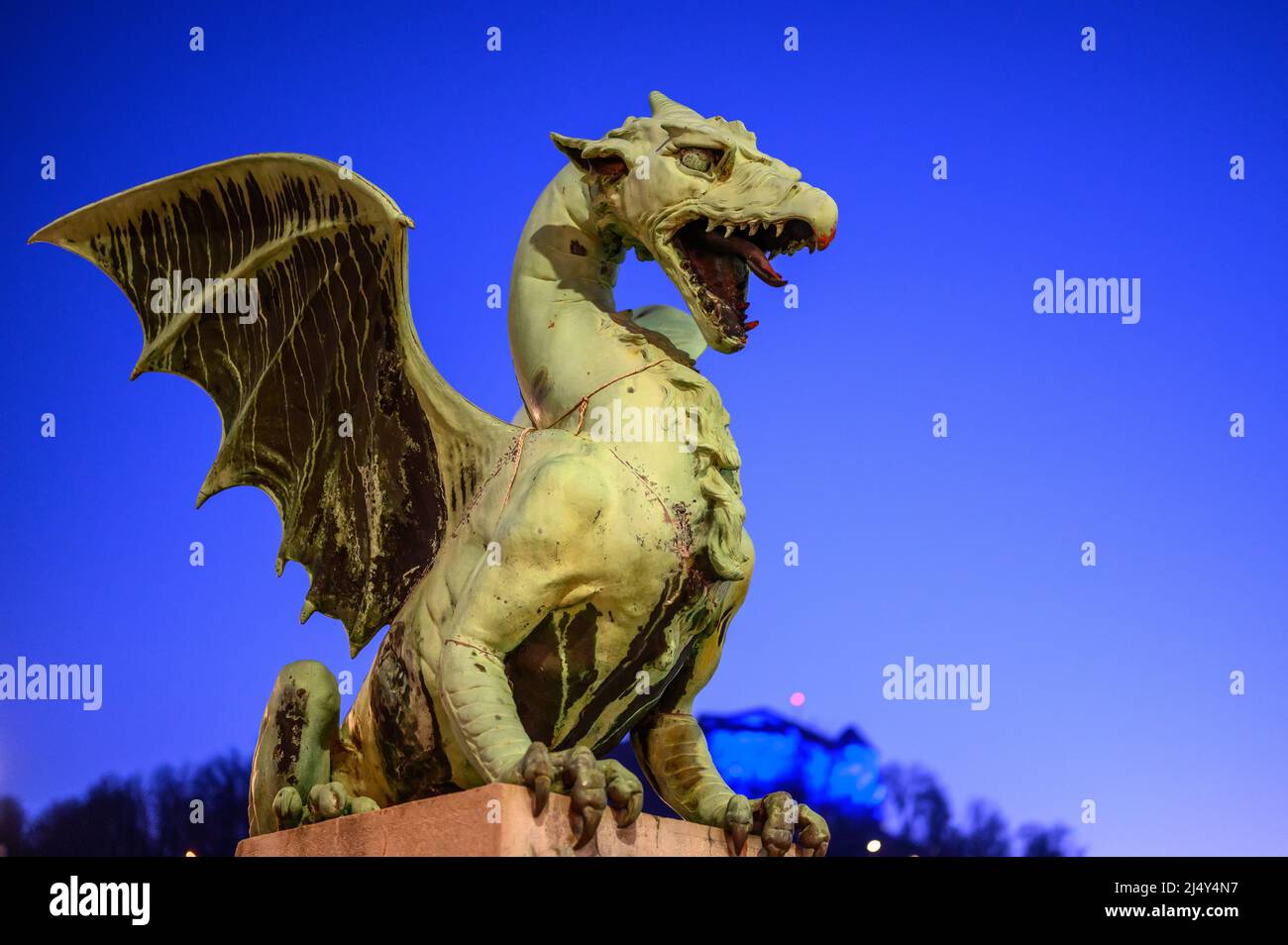 View on the Famous Dragon bridge and the Dragon statue Zmajski at night ...