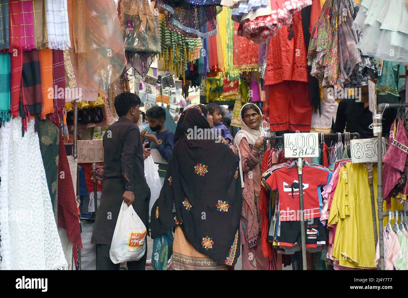 People are busy in Eid shopping ahead of Eid-ul-Fitar, during the Holy ...