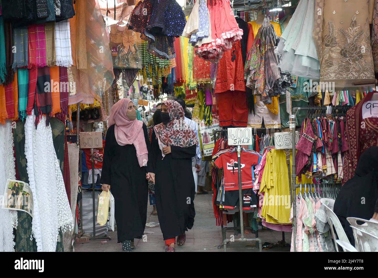 People are busy in Eid shopping ahead of Eid-ul-Fitar, during the Holy ...