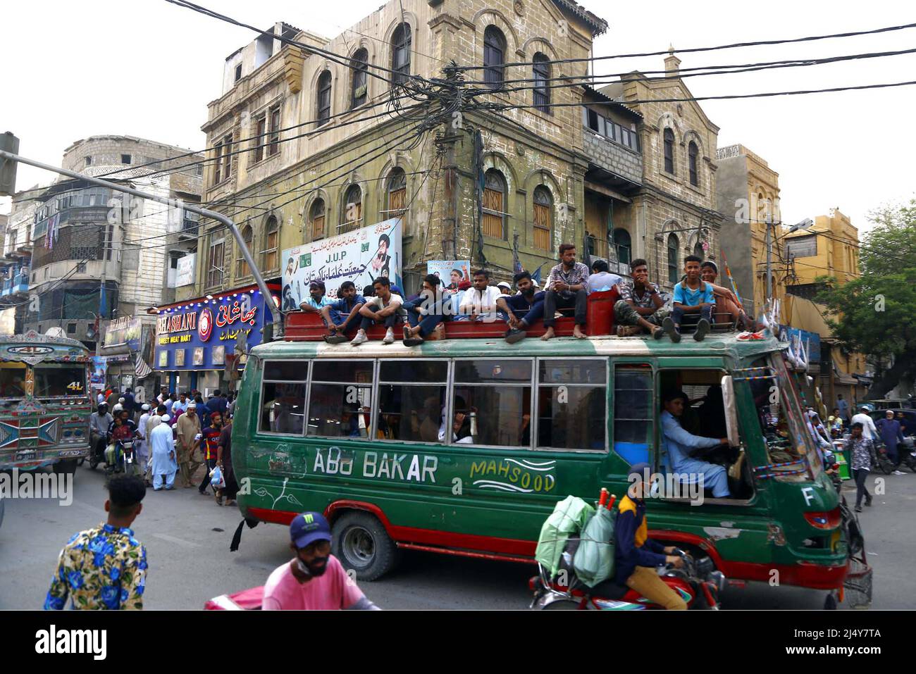 Passengers travelling on an overloaded bus as the short of public ...