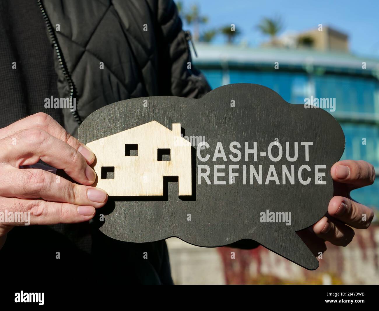 Plate with house and cash out refinance sign Stock Photo - Alamy