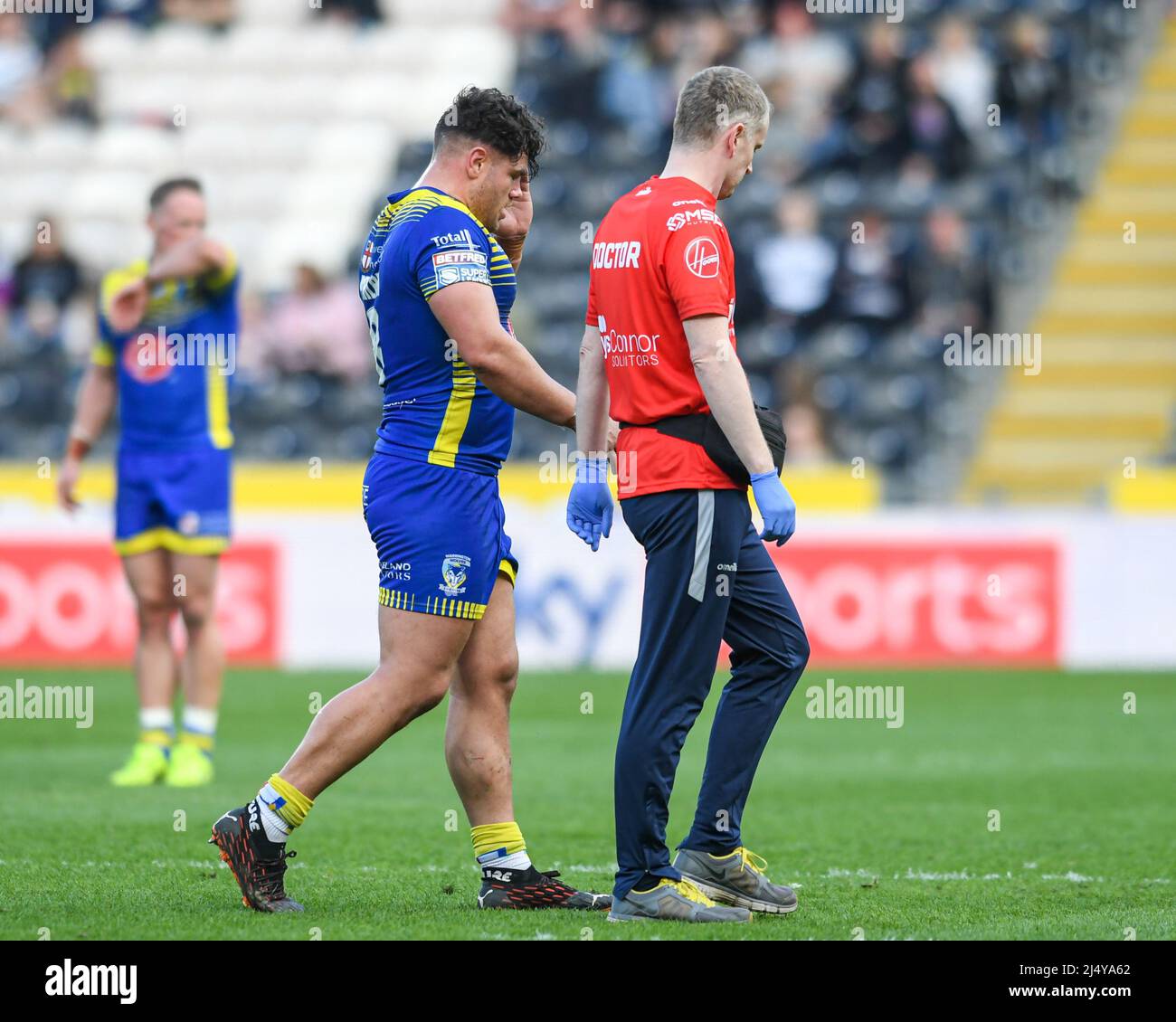 Joe Philbin #8 of Warrington Wolves leaves the pitch for a head ...