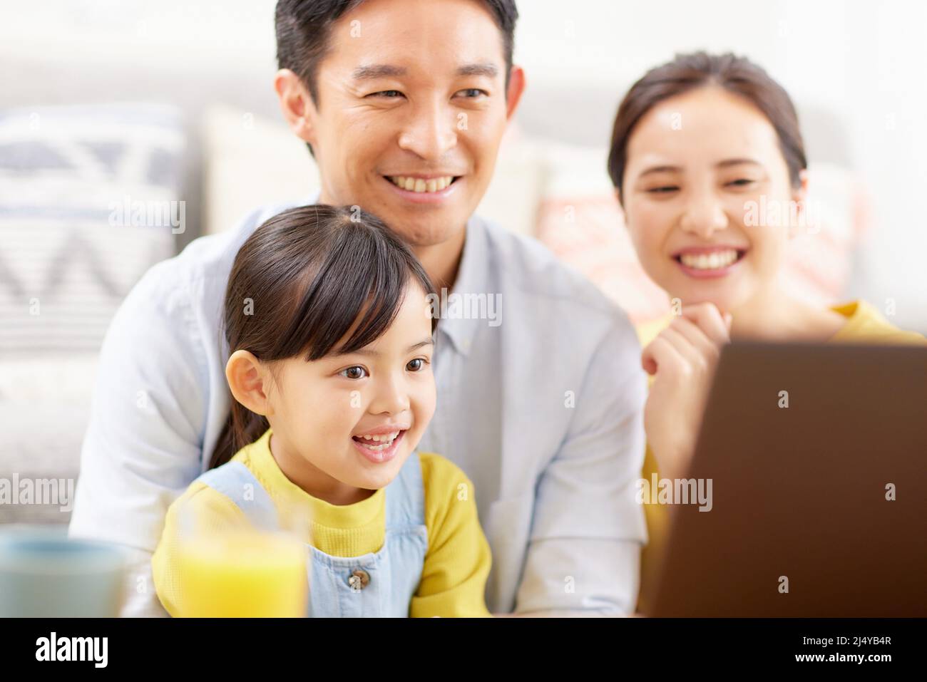Japanese family together at home Stock Photo - Alamy