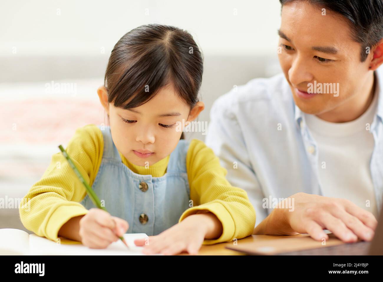 Asian parents homework hi-res stock photography and images - Alamy