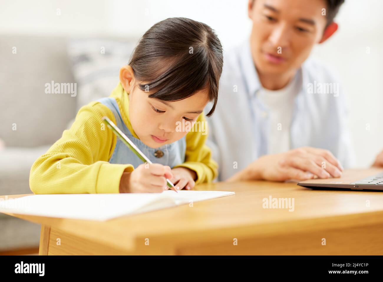 Asian parents homework hi-res stock photography and images - Alamy