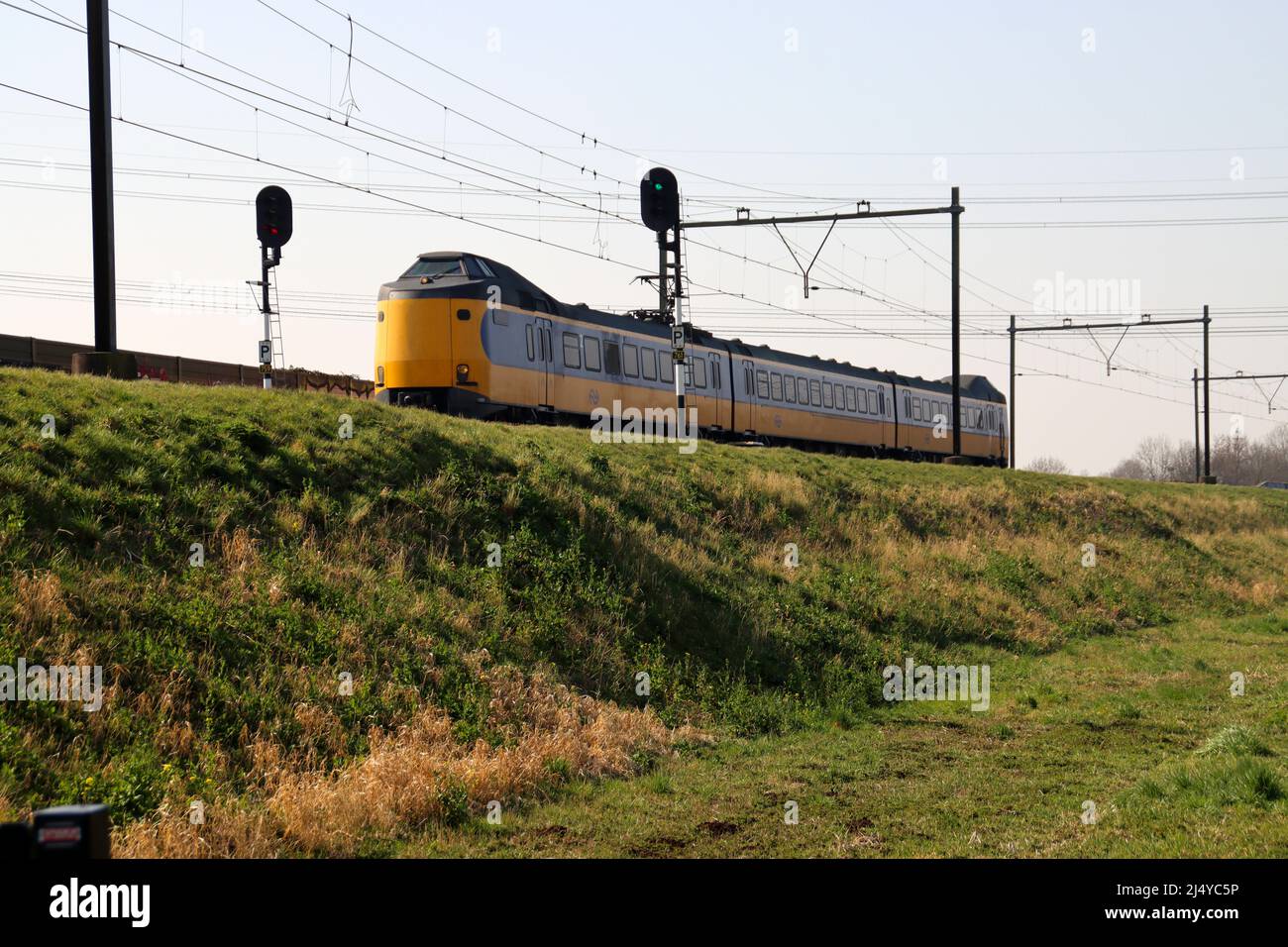 Koploper ICM intercity train on a slope in Nieuwerkerk aan den IJssel ...