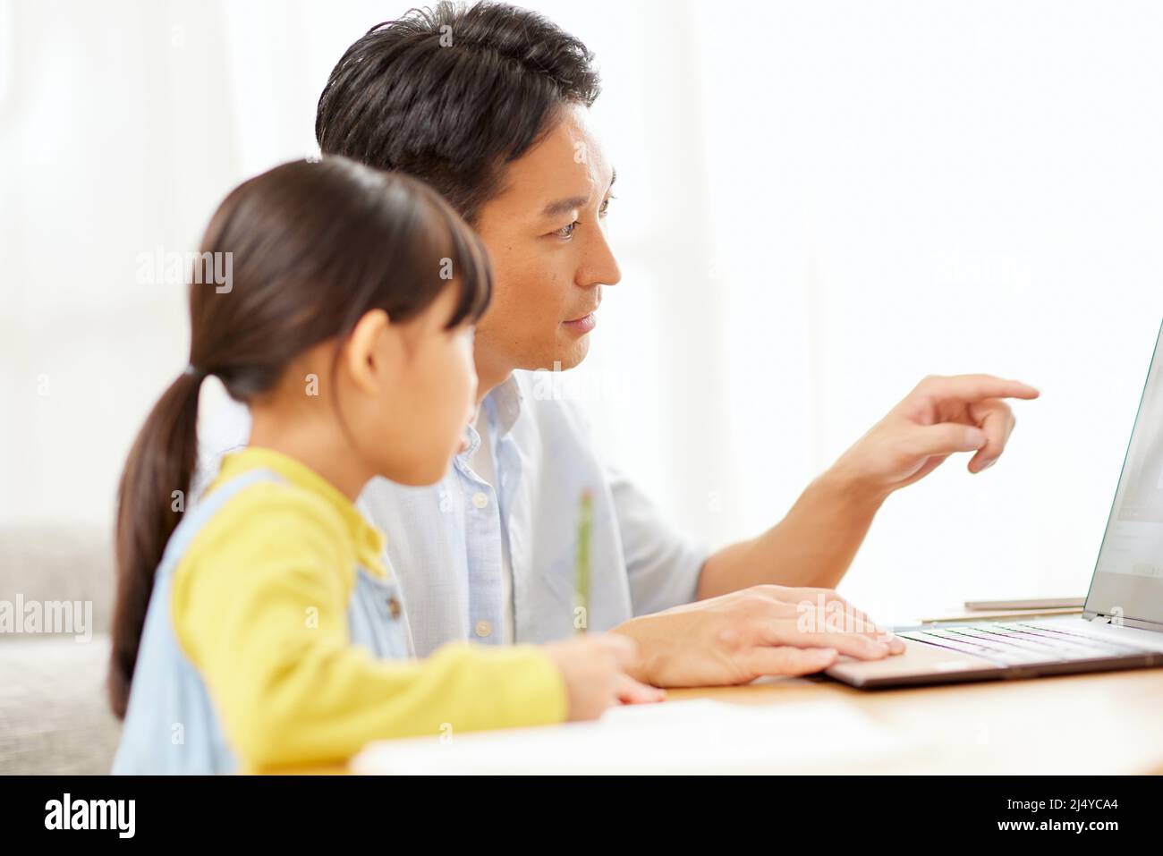 Asian parents homework hi-res stock photography and images - Alamy