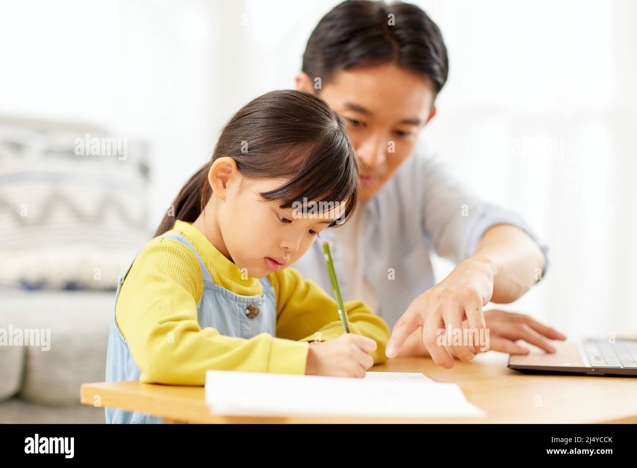 Asian parents homework hi-res stock photography and images - Alamy