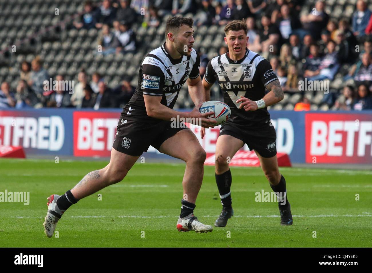 Jake Connor #1 of Hull FC runs with the ball Stock Photo - Alamy