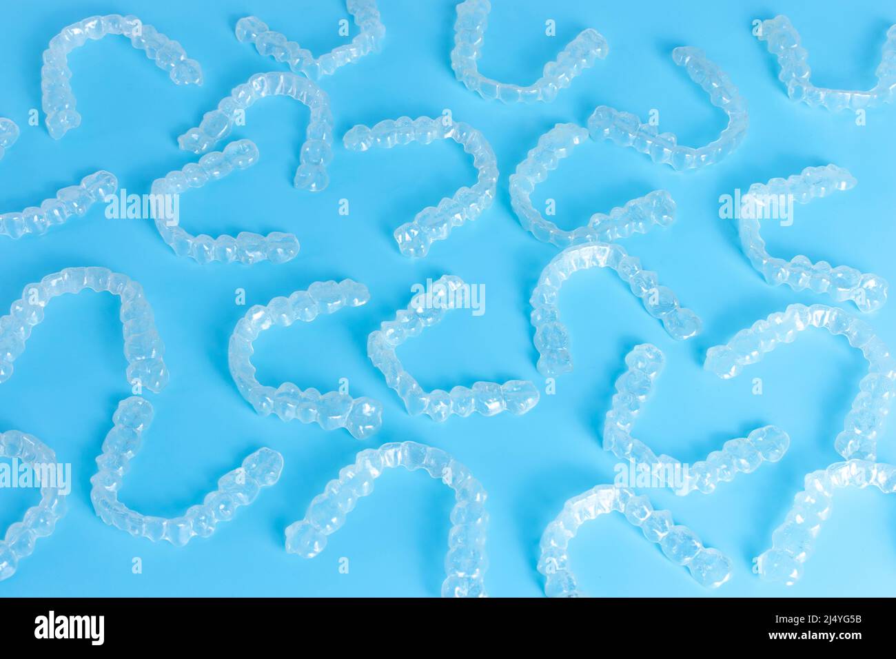 Invisible transparent orthodontic retainers invisalign on blue ...