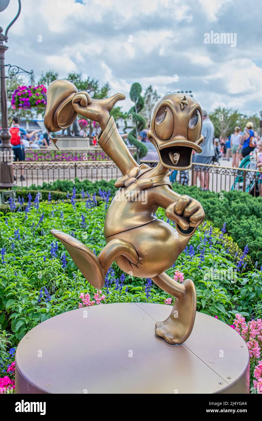 Donald Duck Gold Statue 50th Anniversary Disney Magic Kingdom Stock ...