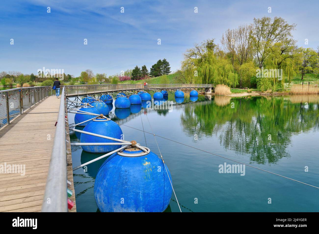 Freiburg, Germany - April 2022: Floating bridge with blue round floats ...