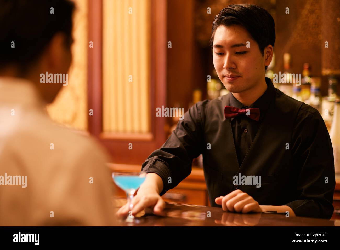 Conversation bartender hi-res stock photography and images - Alamy