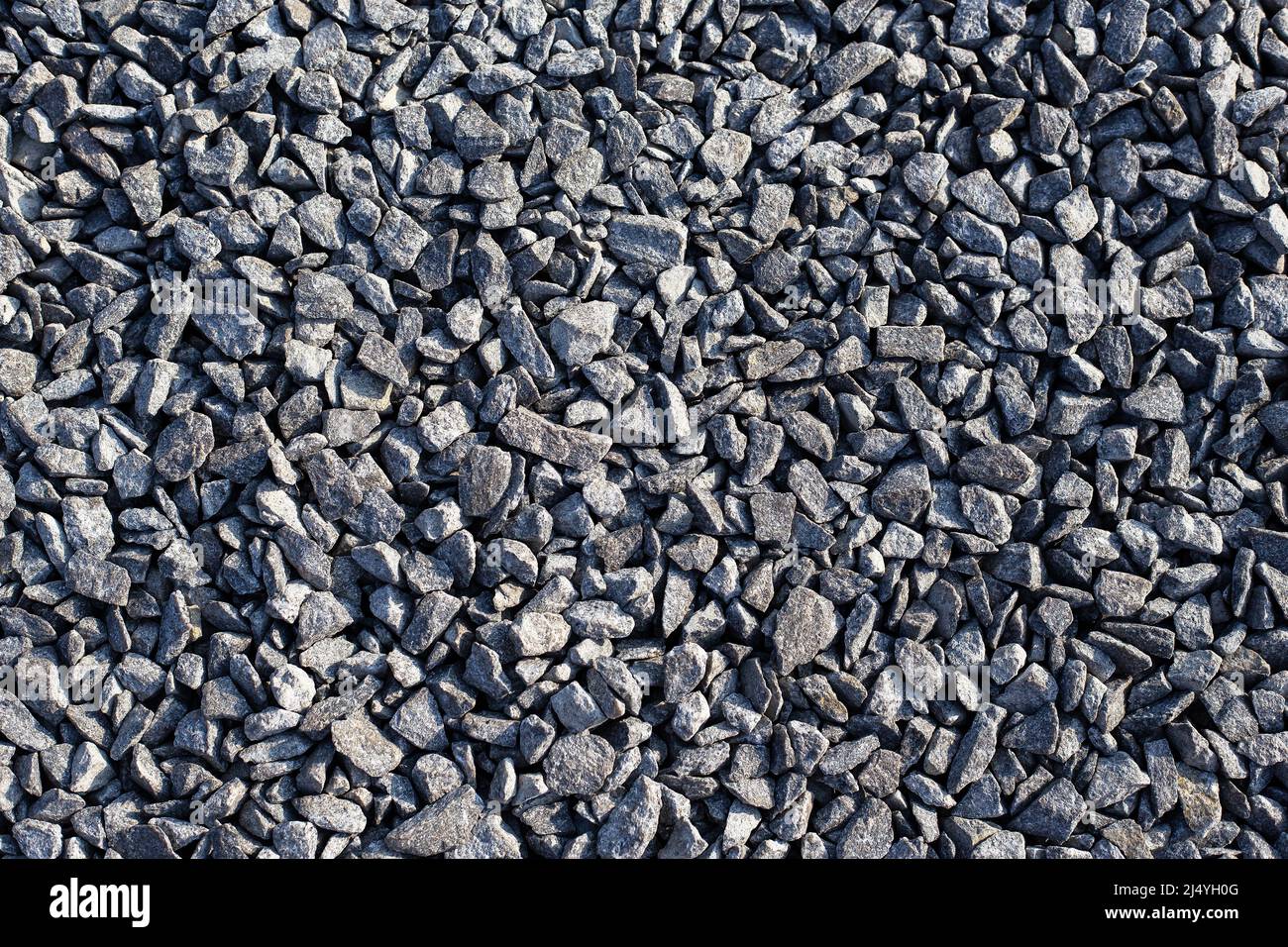 Stone, crushed stone texture background. Top view, close-up. Stone sea ...