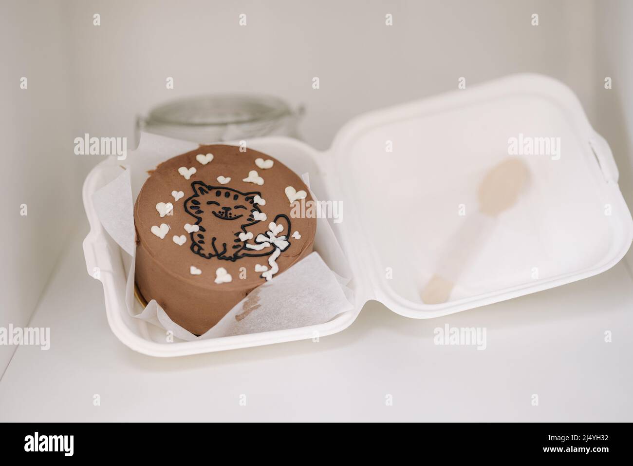 Bento cake with cute picture of cat and white sugar hearts in eco box ...