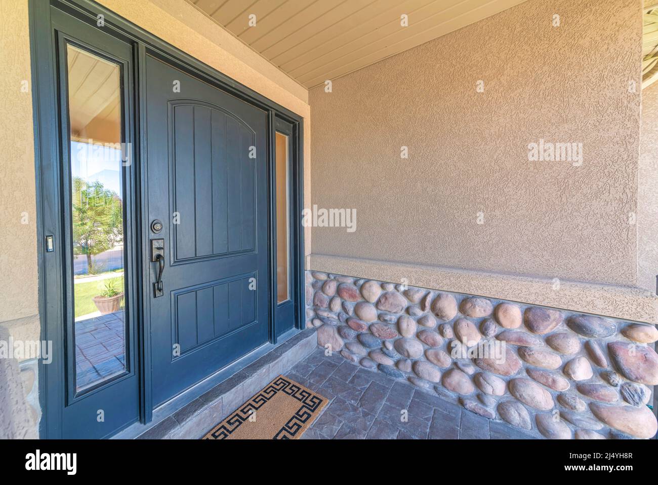 Side view of a black front door with two side glass panels Stock Photo ...