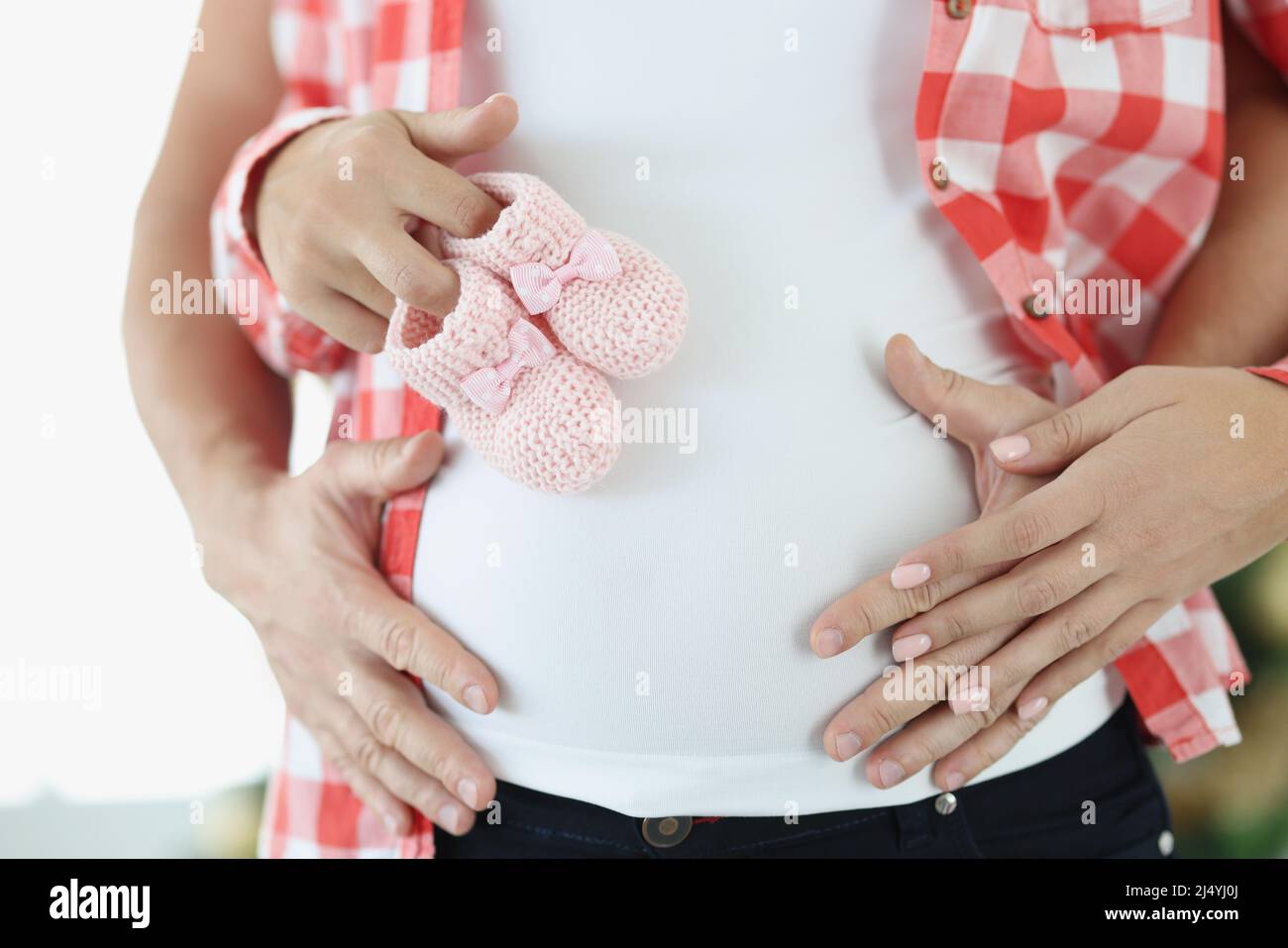 Woman hug stomach not prgnant hi-res stock photography and images - Alamy