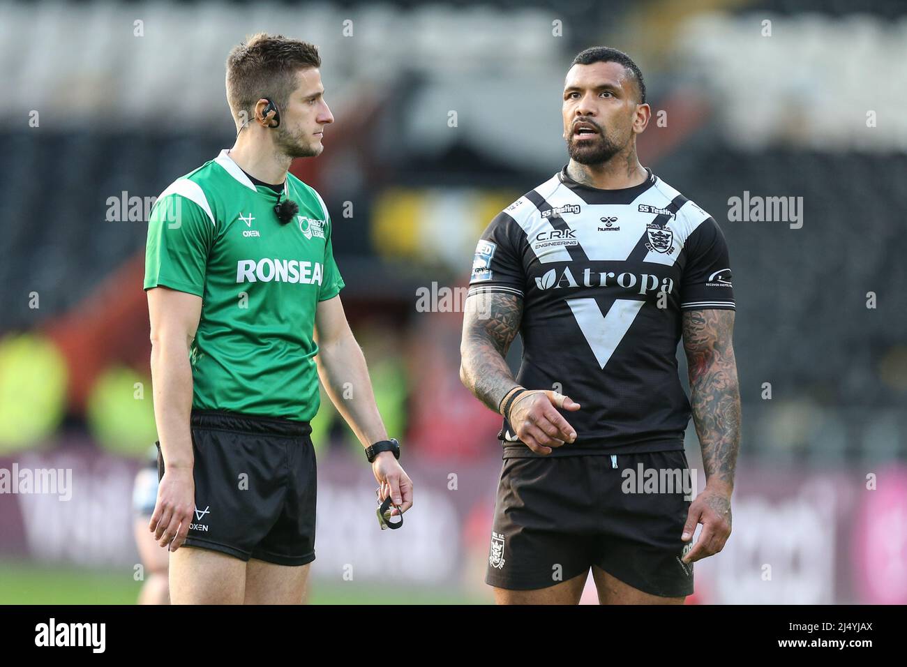 referee Chris Kendall and Manu Ma'u #12 of Hull FC during the game ...