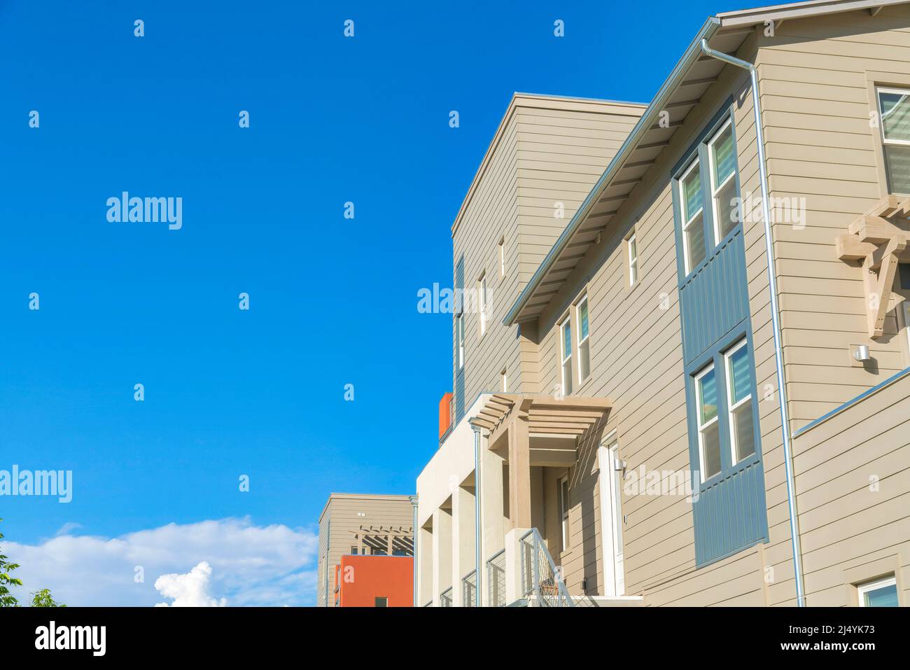 Side view of a residential building with beige vinyl lap sidings at ...