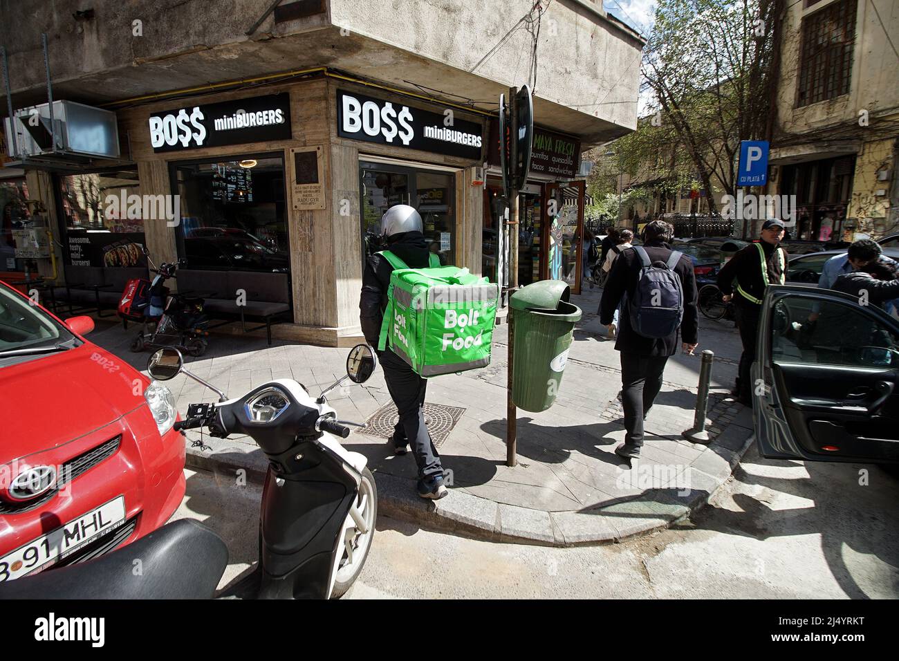 Bucharest, Romania - April 12, 2022: A Bolt Food delivery courier ...