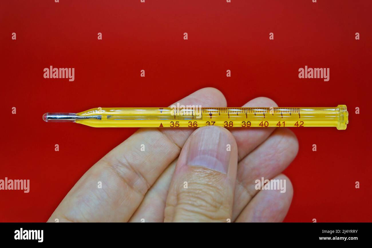 RIO DE JANEIRO, BRAZIL - JANUARY 23, 2021: Hand holding a mercury ...