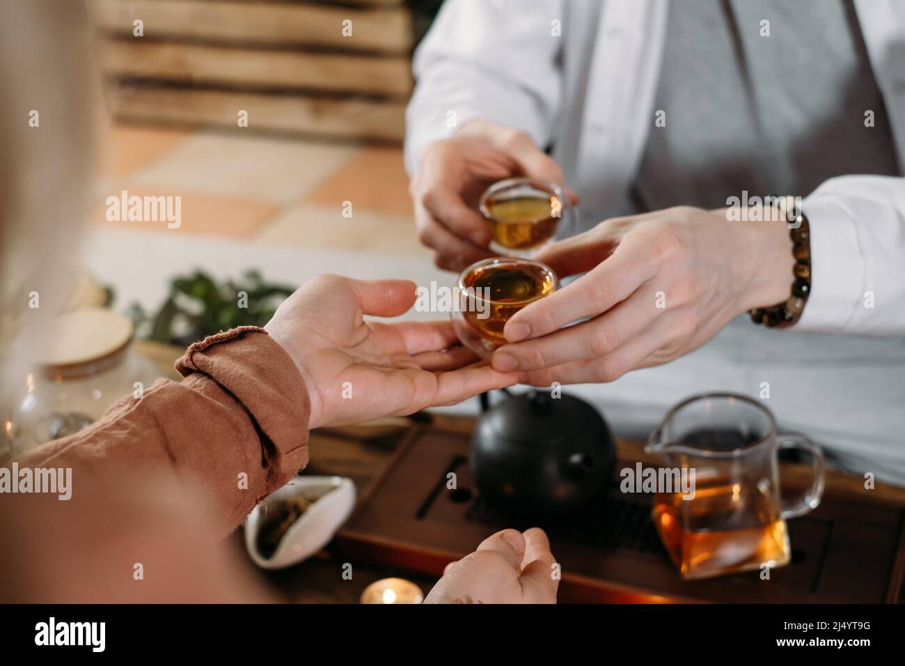 Drinking tea in traditional Chinese ceremony Gun Fu Cha Stock Photo - Alamy