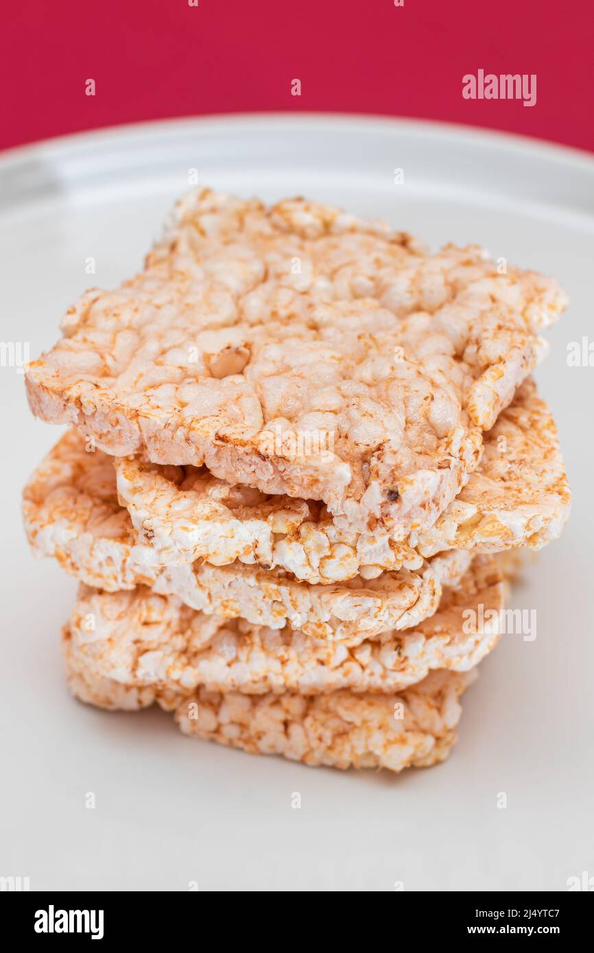 A Stack of Square Rice Cakes on White Plate. Dietary Crispbread Stock ...
