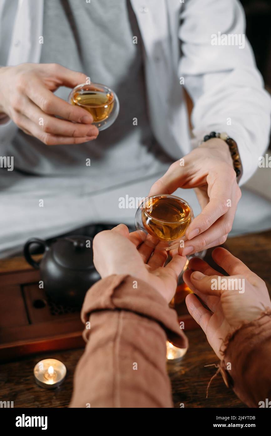 Drinking tea in traditional Chinese ceremony Gun Fu Cha Stock Photo - Alamy