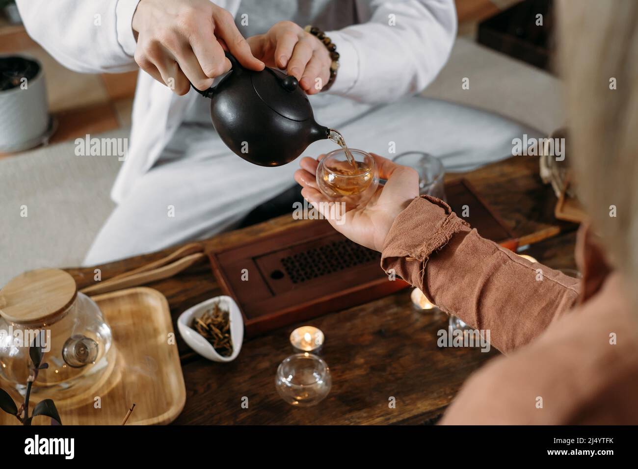 Drinking tea in traditional Chinese ceremony Gun Fu Cha Stock Photo - Alamy