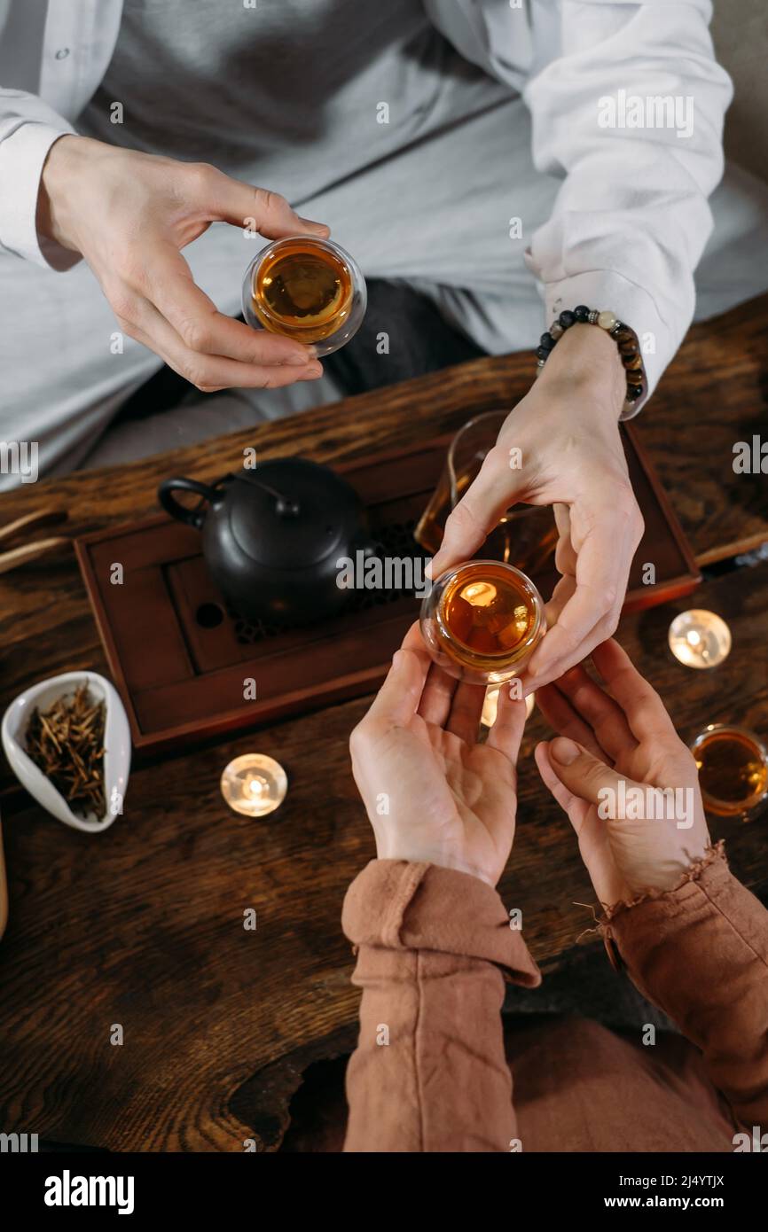 Drinking tea in traditional Chinese ceremony Gun Fu Cha Stock Photo - Alamy