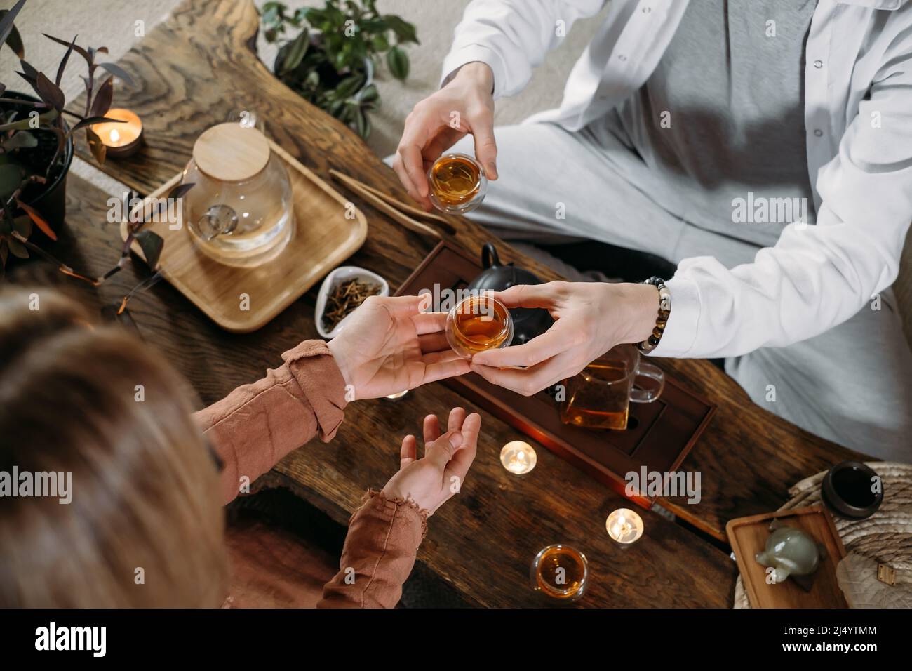 People drinking tea in traditional Chinese ceremony Gun Fu Cha Stock ...