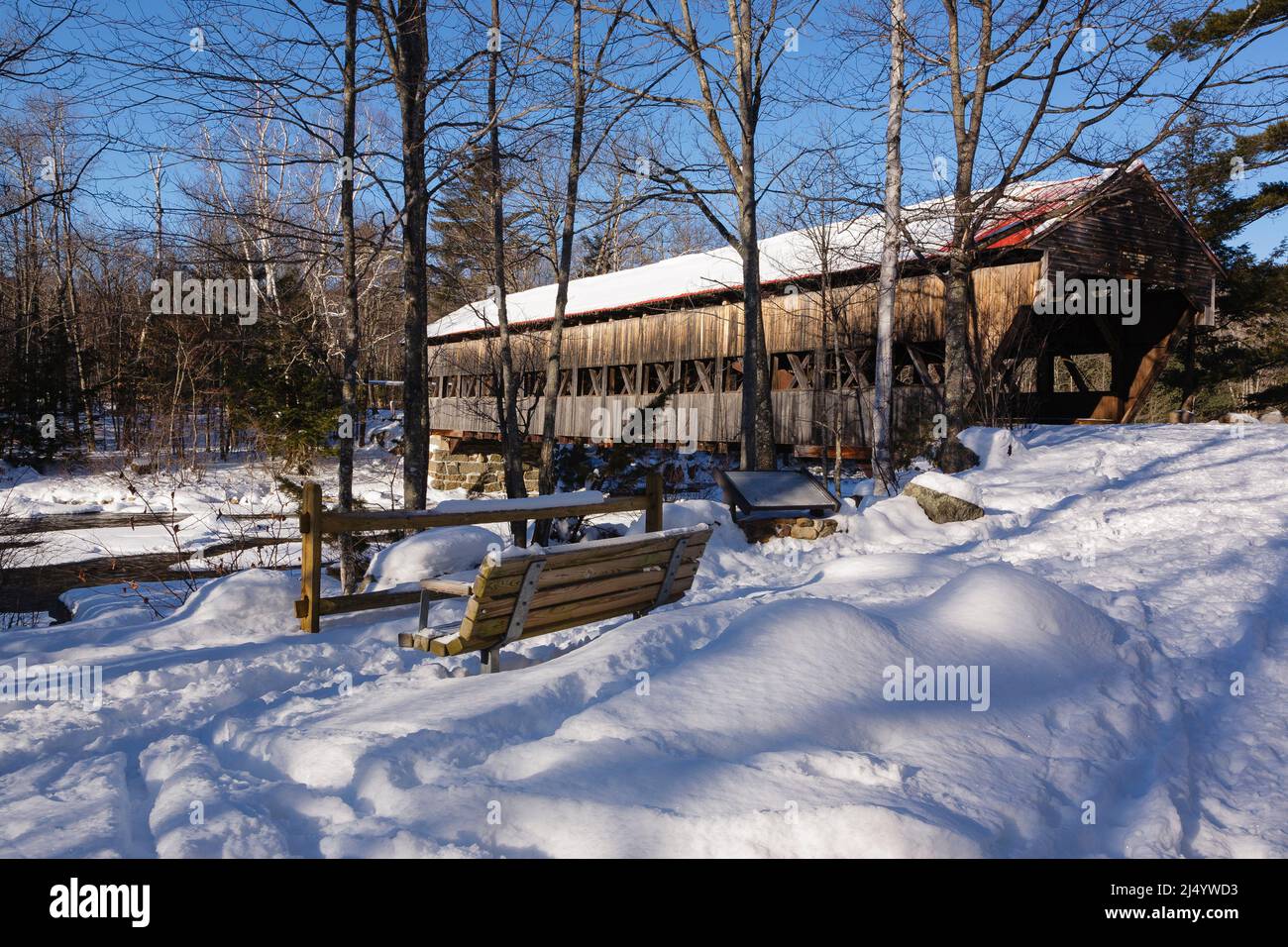 Albany Covered Bridge in Albany, New Hampshire covered in snow. Located ...