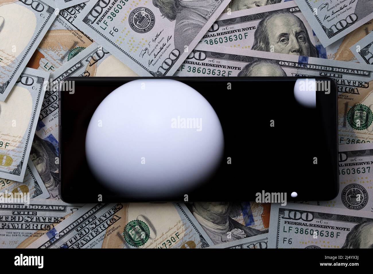 Smartphone with the NFT Merge digital art by Murat Pak. The most ...