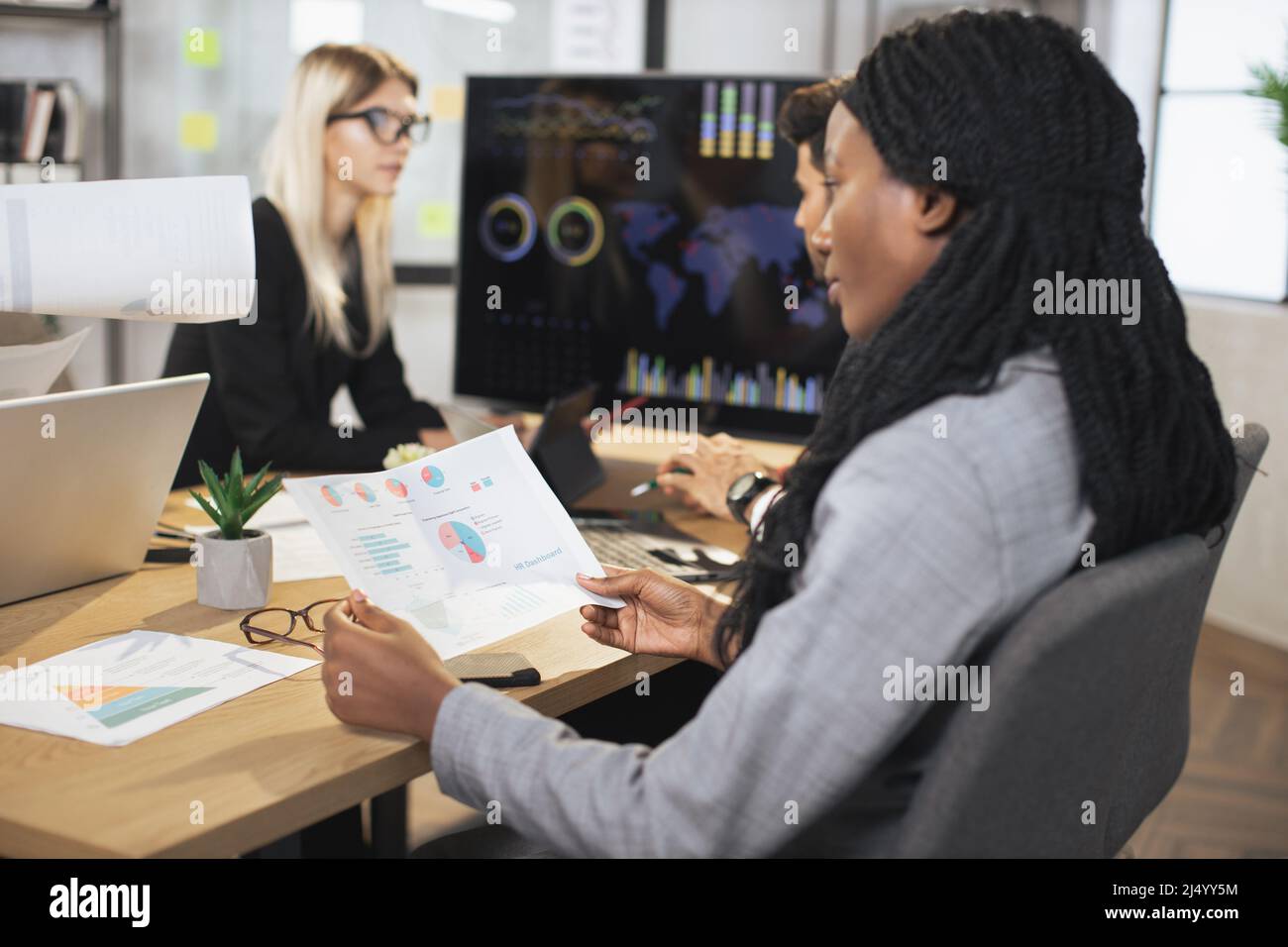 Team of diverse businesspeople having meeting in at office. Back ...