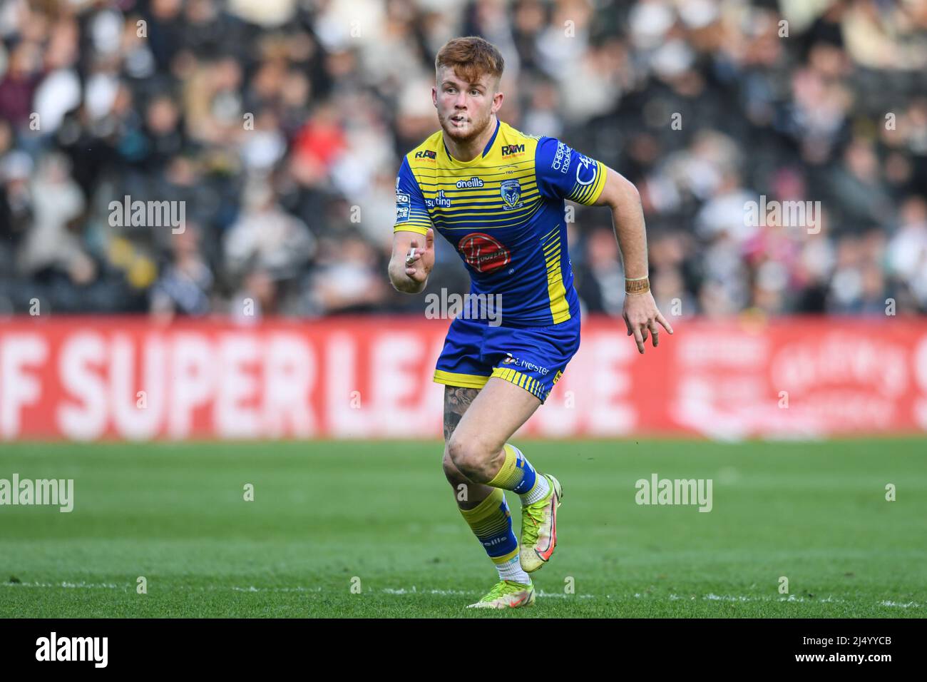 Ellis Longstaff #24 of Warrington Wolves runs during the game Stock ...
