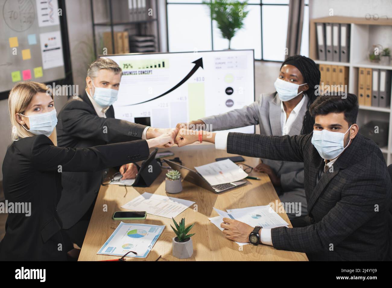 Work during covid pandemic. Happy multiethnic business people in face ...