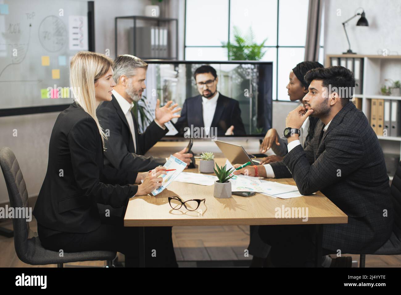 Business, teamwork concept. Group of focused professional international ...