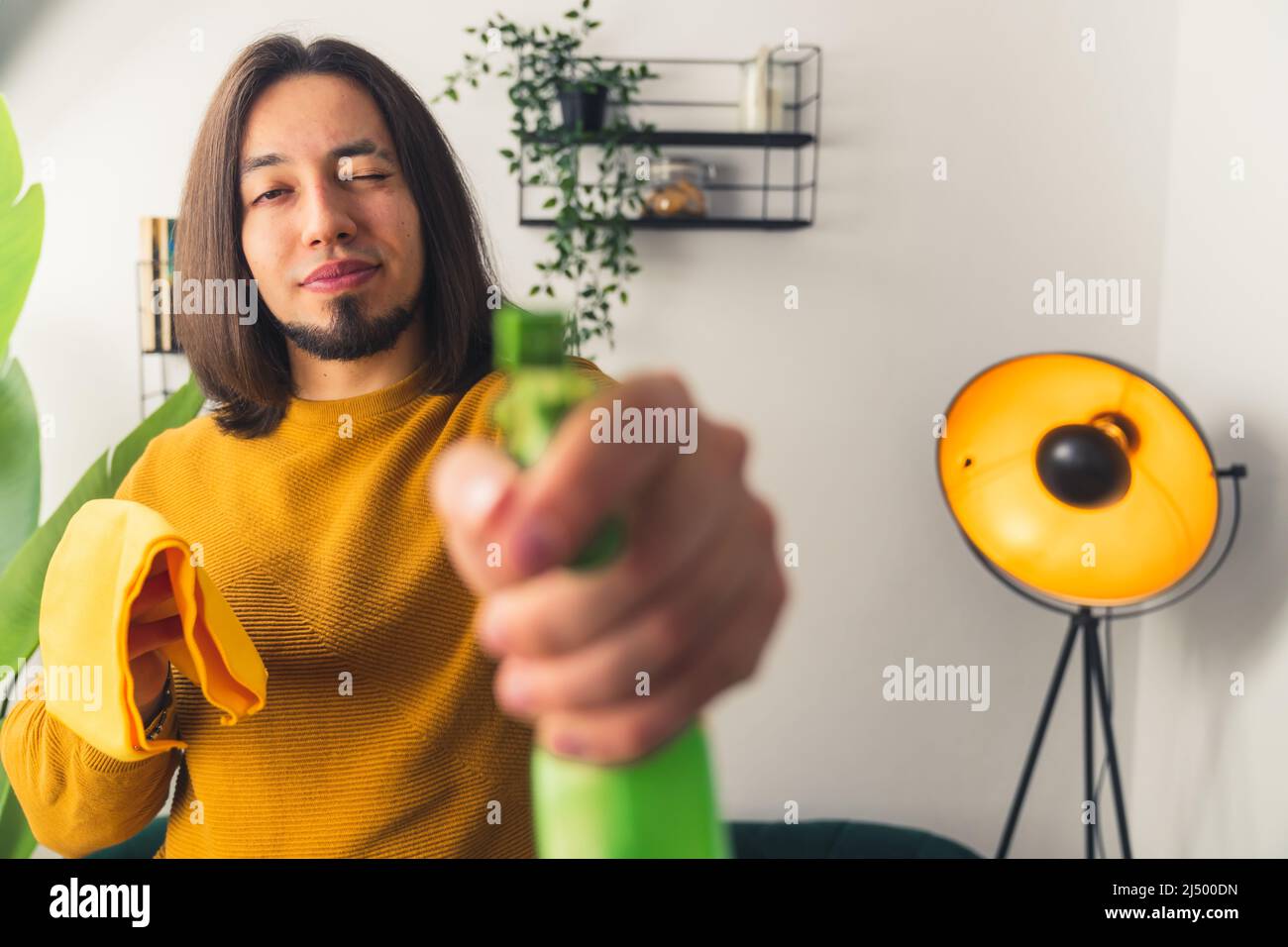 Cheerful handsome man winking hi-res stock photography and images - Alamy