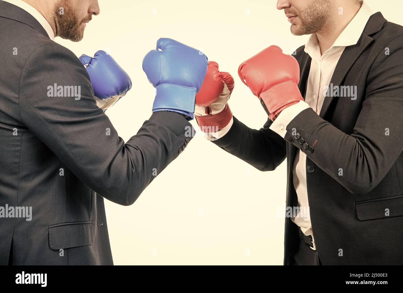 Professional men cropped view in business suits stand in fighting ...