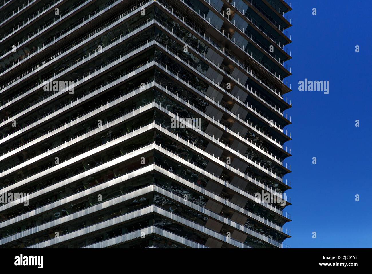 Balconies of modern glass building skyscrapers Stock Photo - Alamy