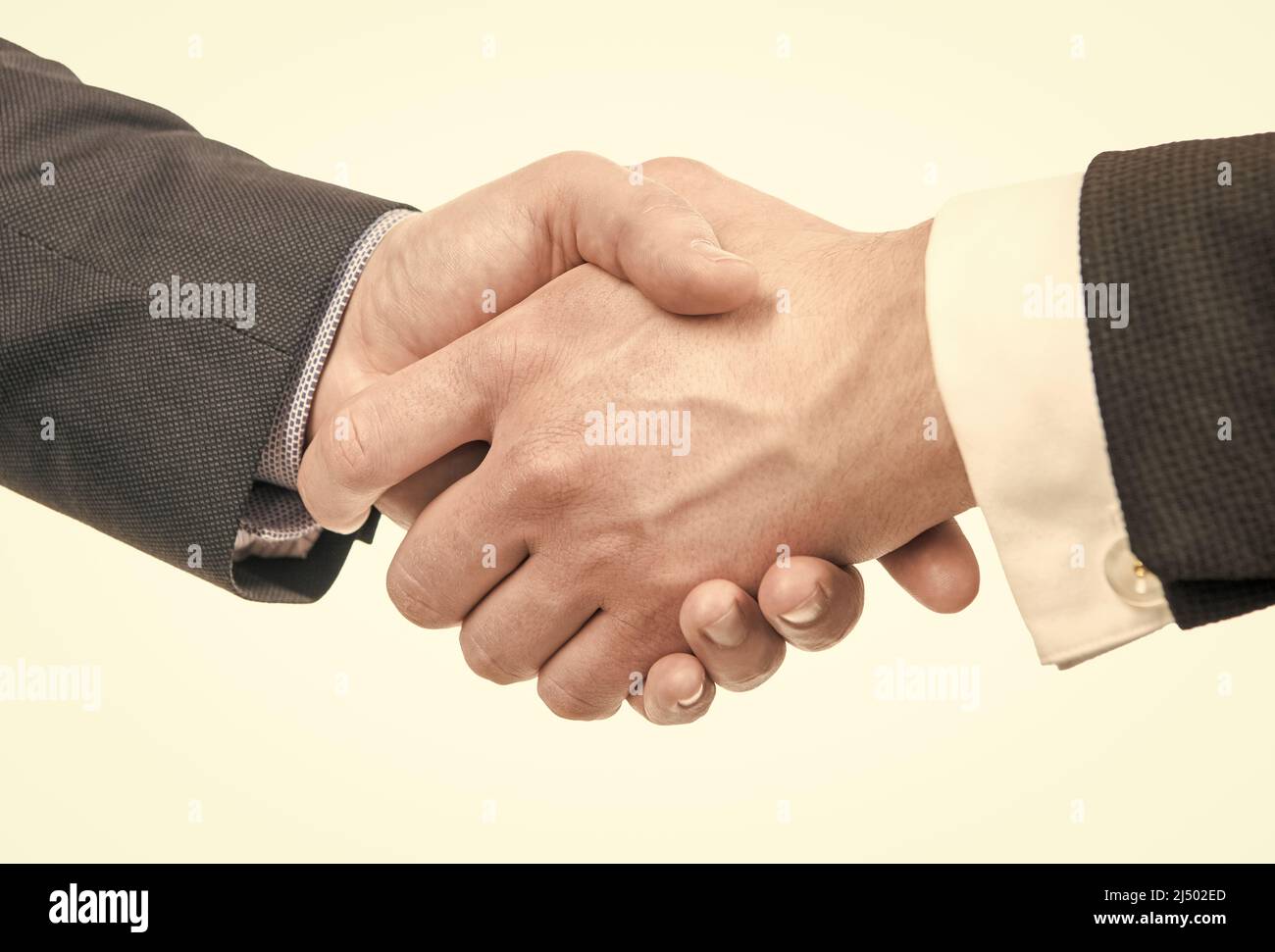Male hands shaking as formal greeting business etiquette isolated on ...