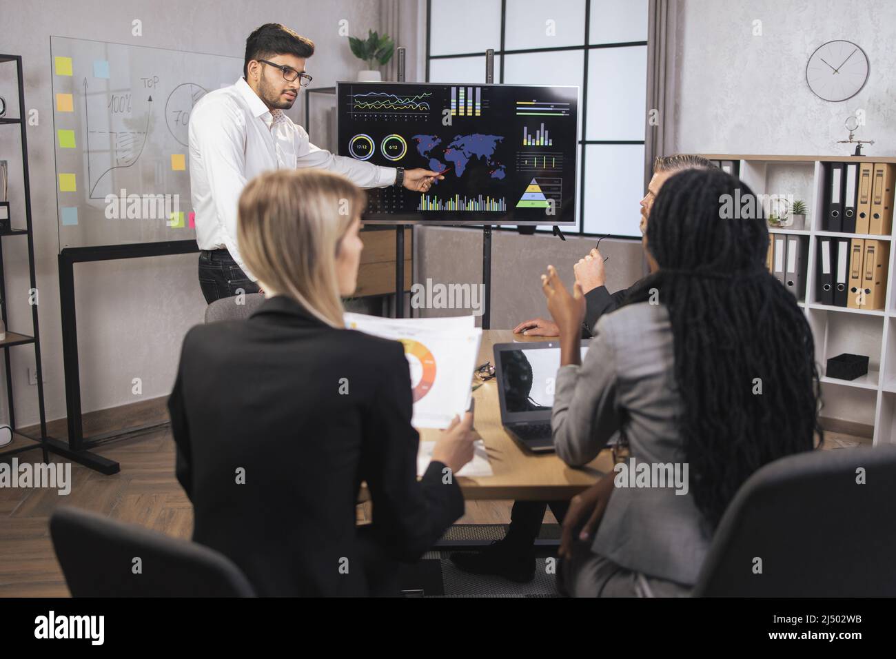 Diverse multiracial business colleagues at office boardroom, discussing ...