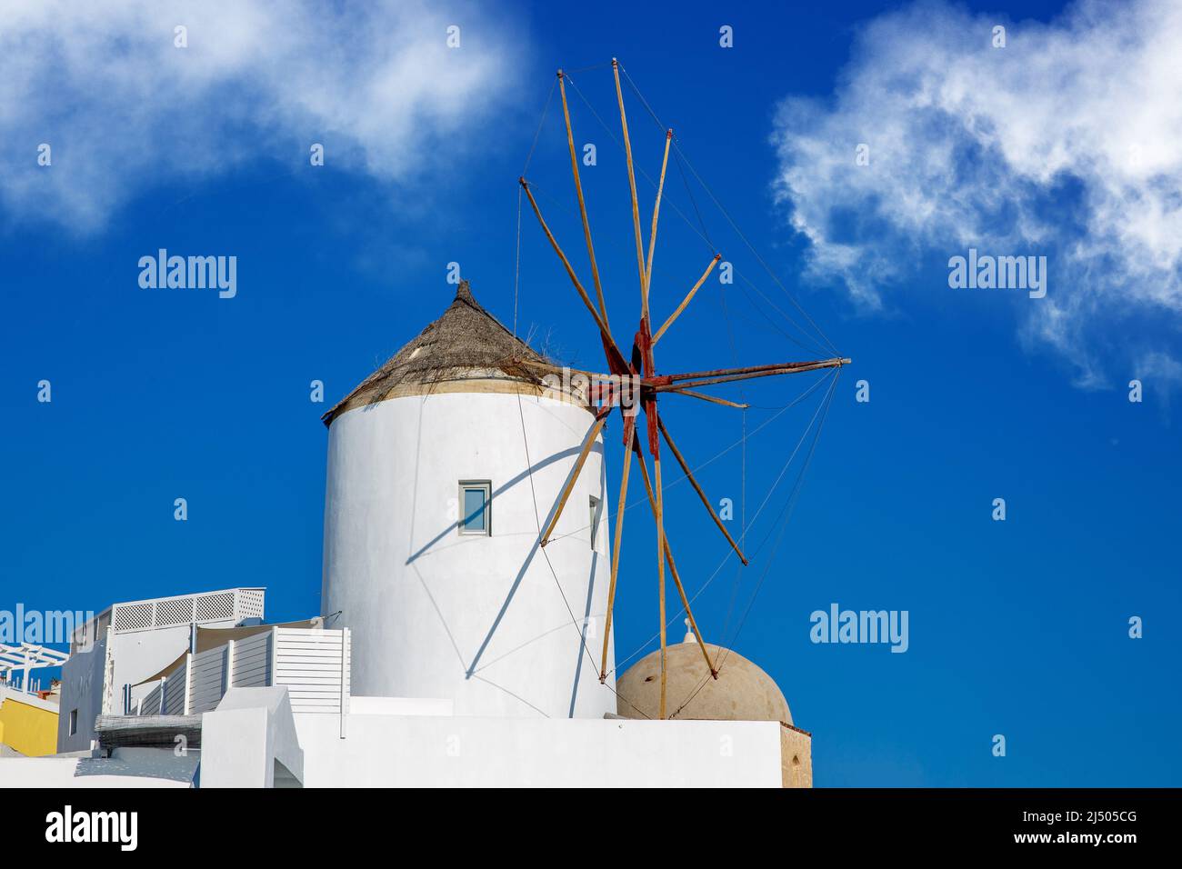 Traditional Greek windmill against the blue sky Stock Photo - Alamy