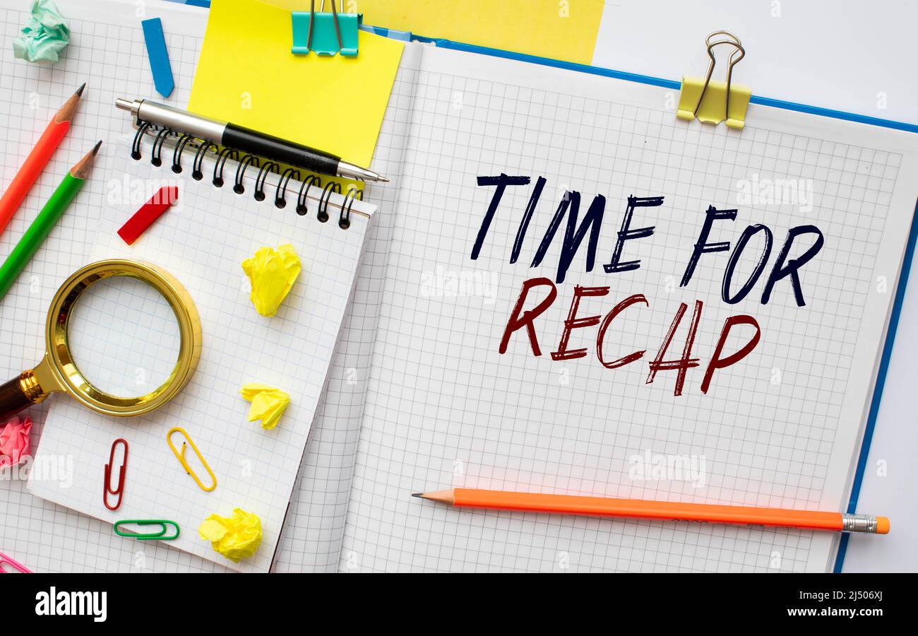 A sheet of craft paper with TIME FOR RECAP text attached to a white ...