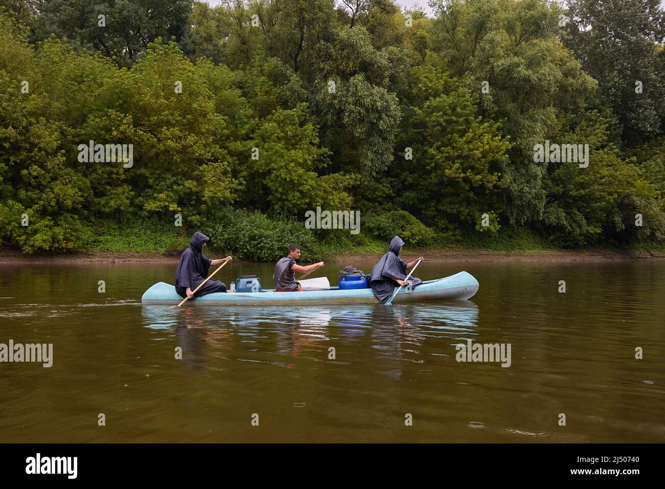 Row boat rain hi-res stock photography and images - Alamy