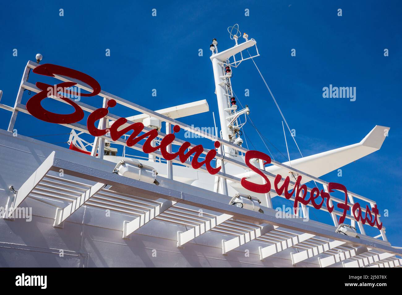 Looking up at the ship’s name and communications array of the Bimini ...