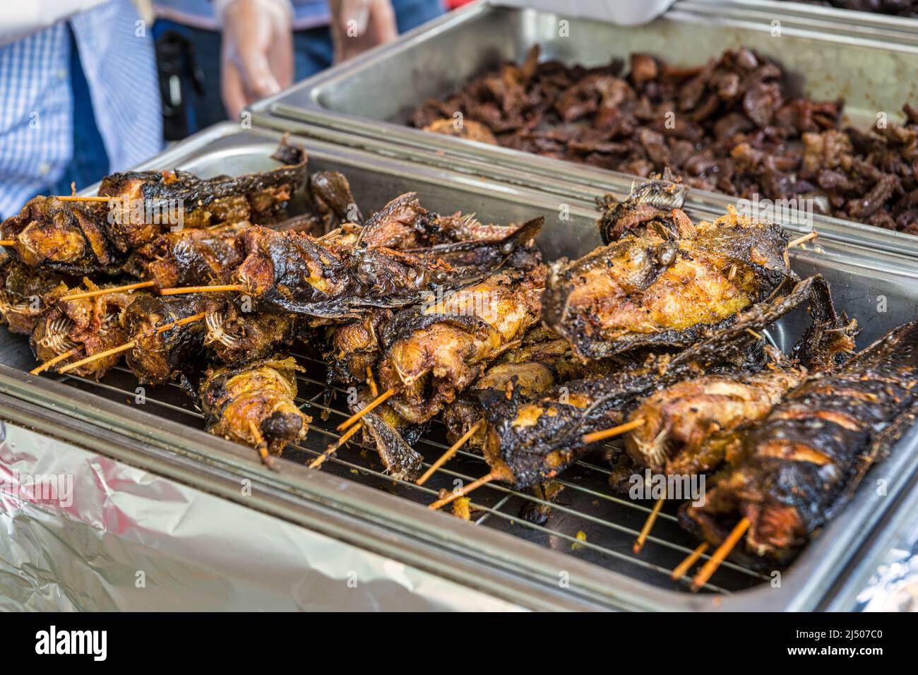 Grilled fish on skewers at the Thai New Year Festival at Wat ...