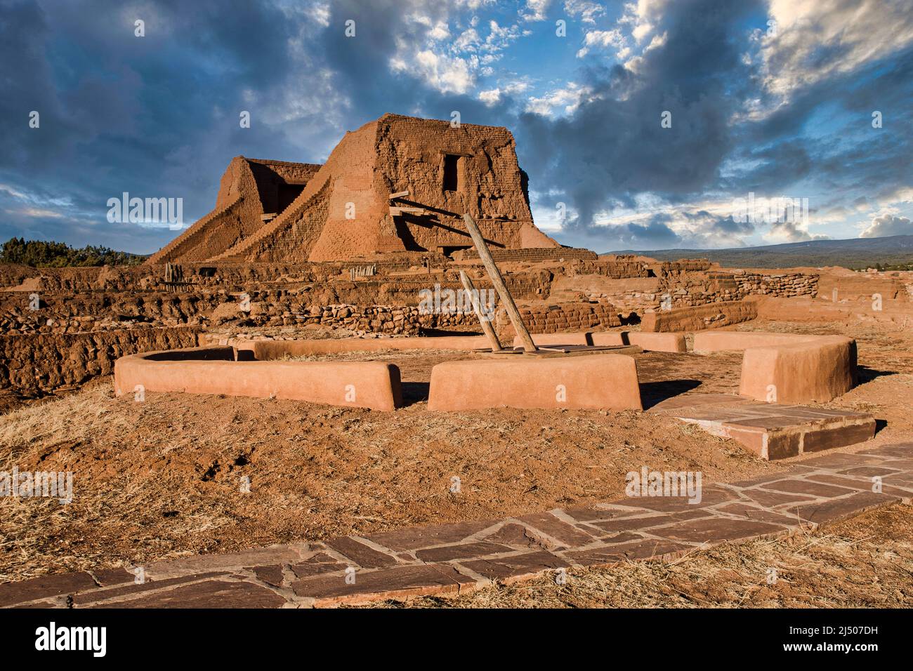 A Native American Kiva reconstruction by the ruins of the Spanish ...